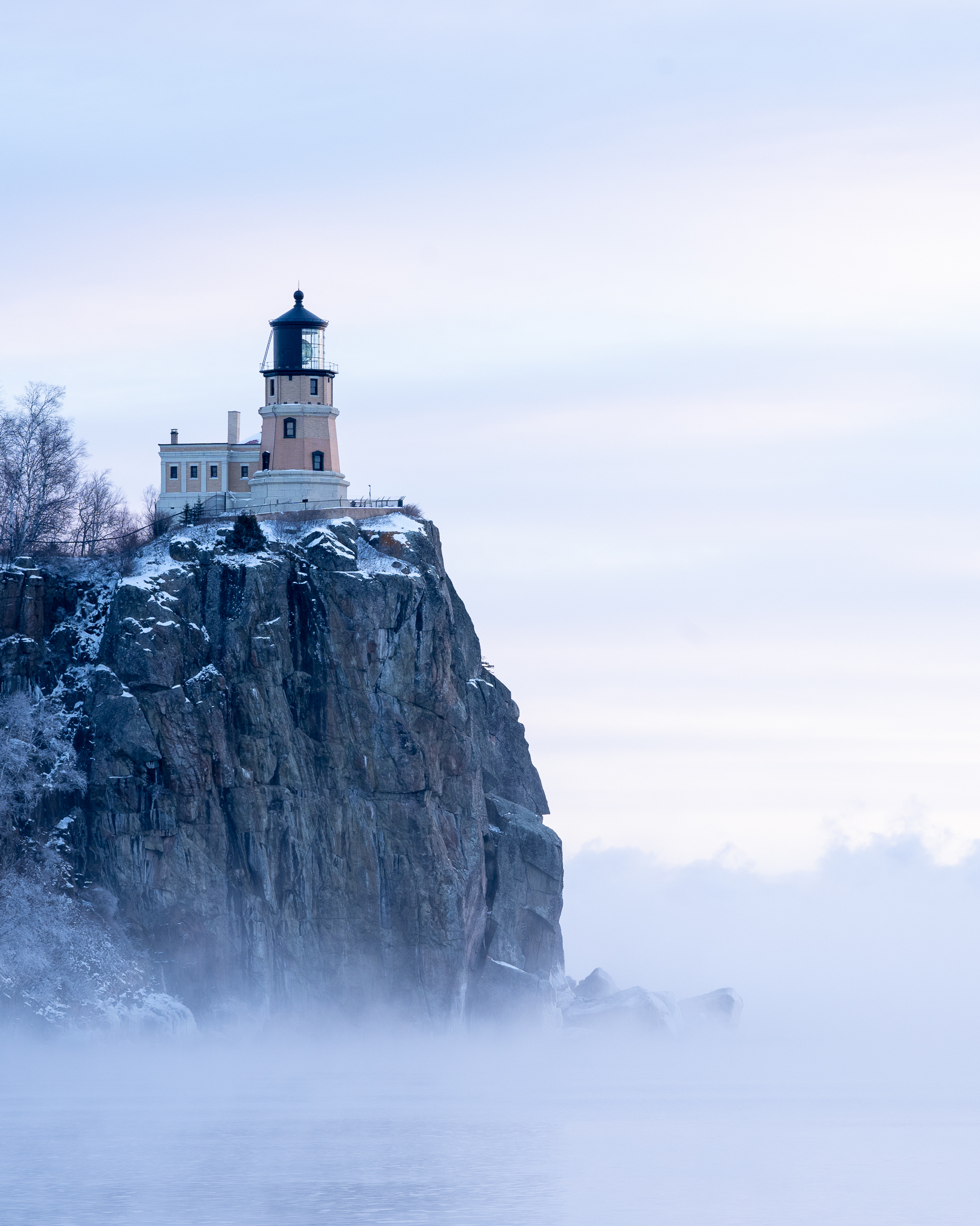 Split Rock Lighthouse with blue hour sea smoke - Joshua Steele Photography